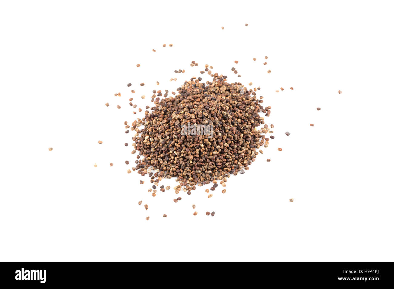 Decorticated cardamom seeds pile on a white background Stock Photo - Alamy