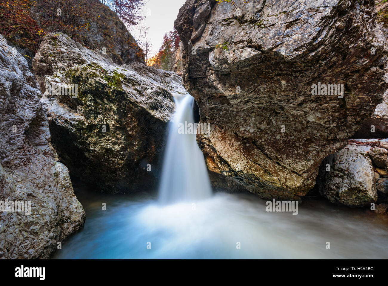 Landscape with a waterfall in the mountains, slow shutter speed Stock ...