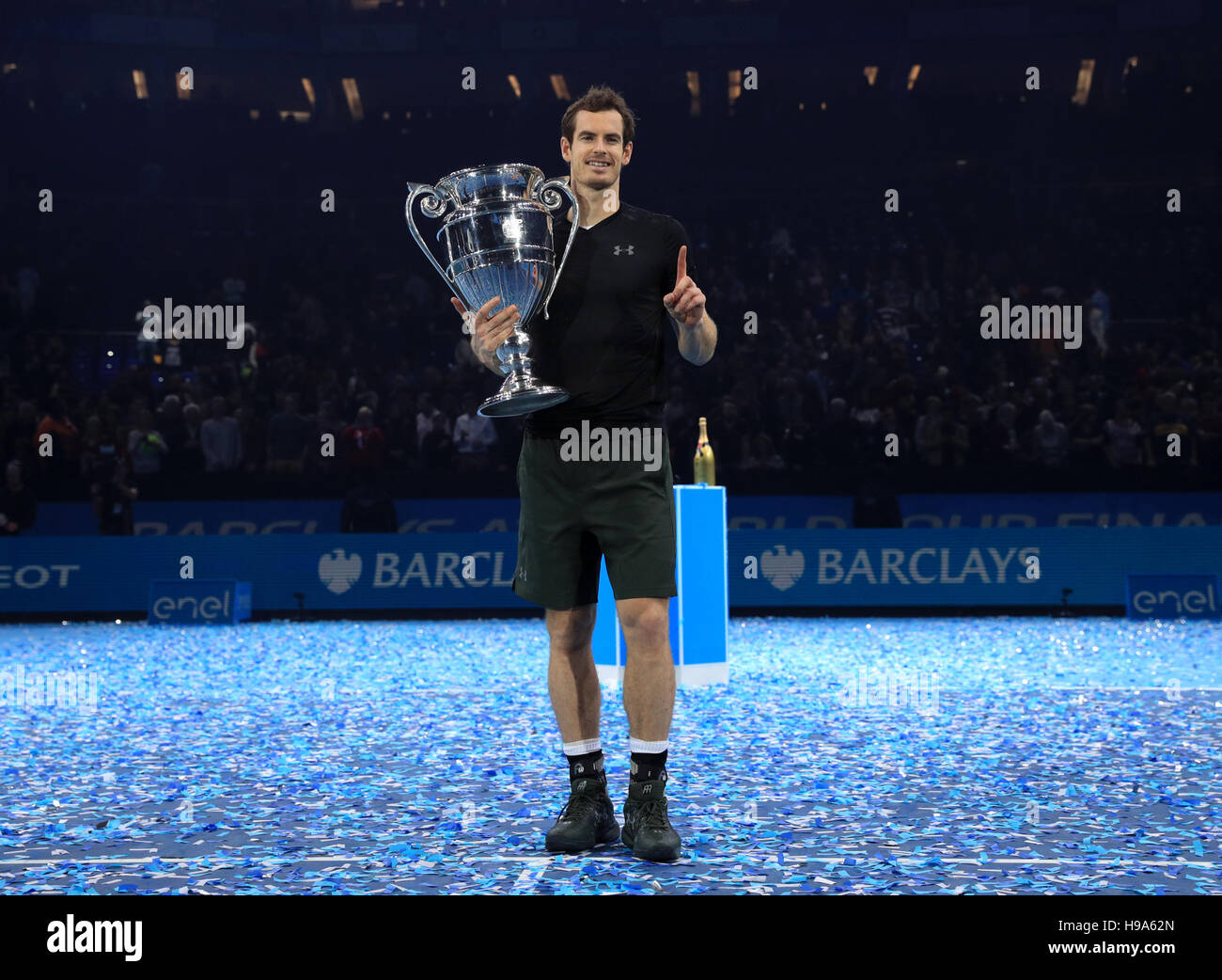 Andy Murray poses with the trophy he earnt for finishing the year as ...