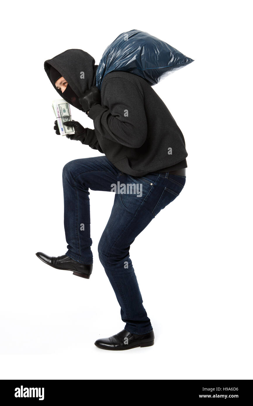 Thief steals money and bag Stock Photo - Alamy