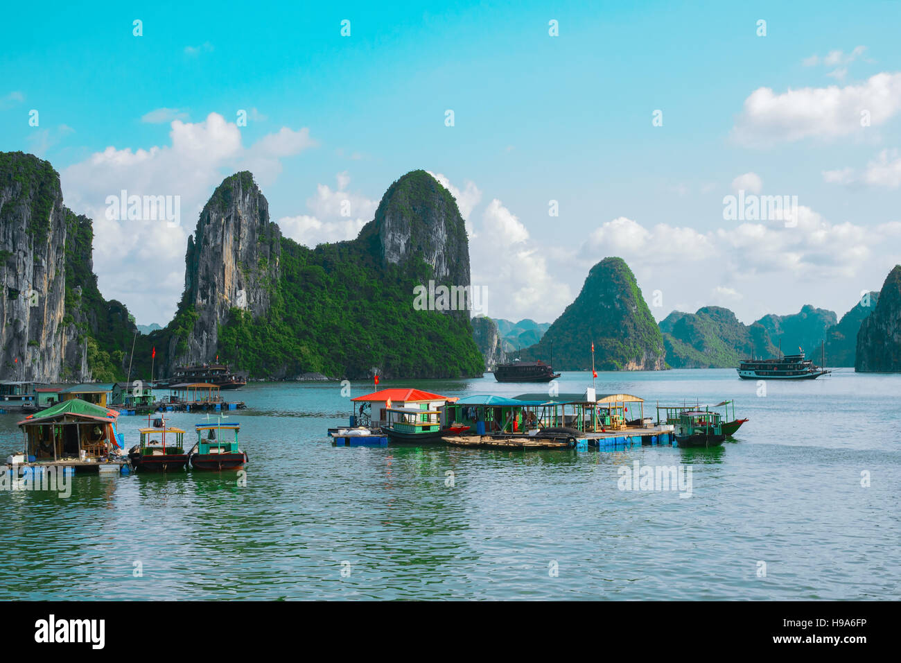 Floating fishing village and rock islands in Halong Bay, Vietnam ...