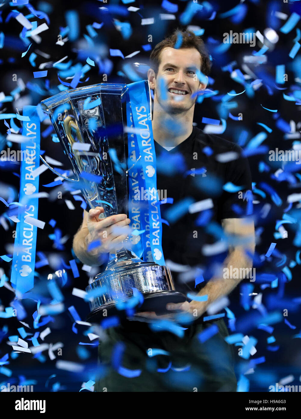 Andy Murray poses with the trophy after winning the championship during ...