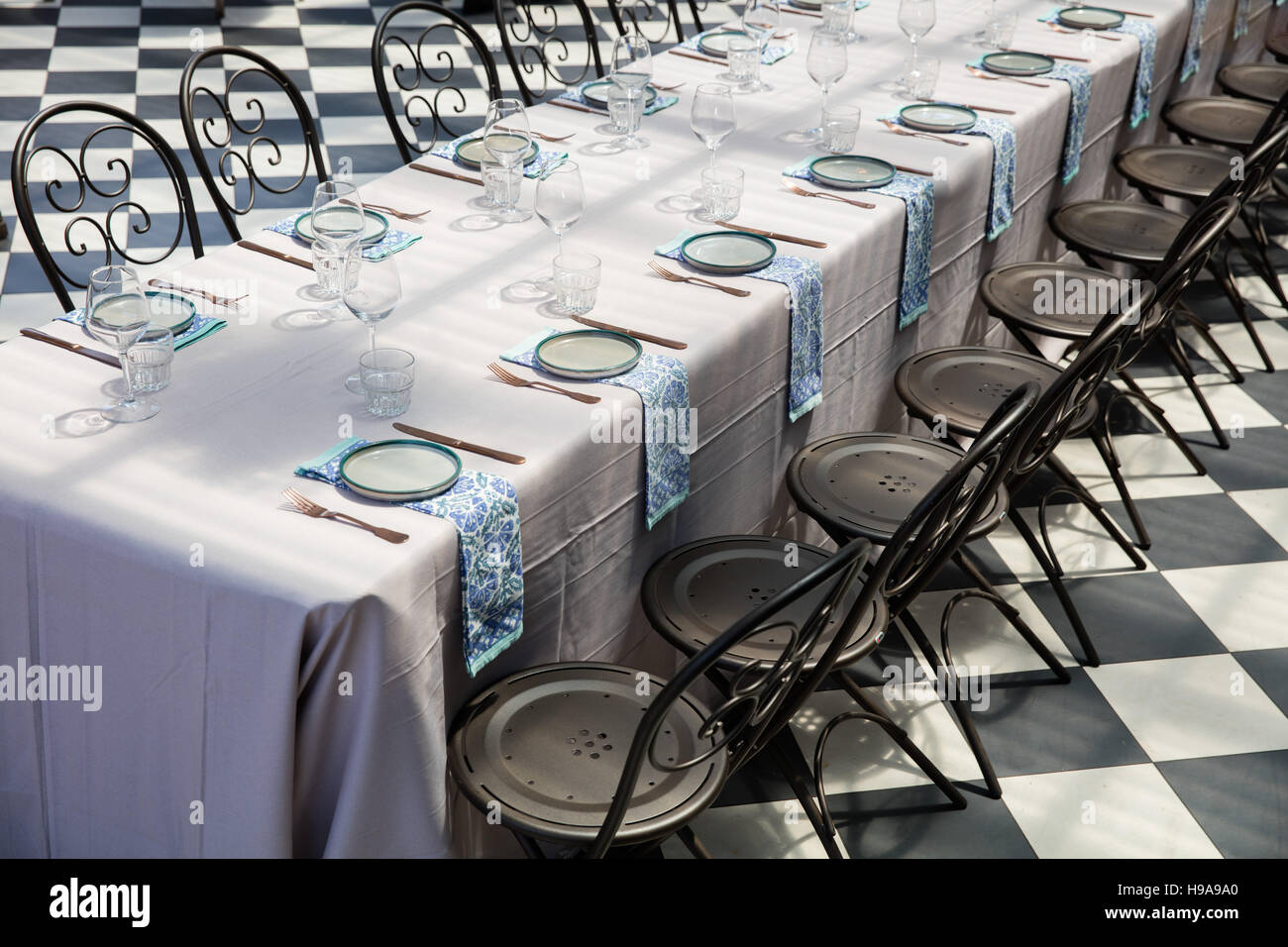 A long table laid out ready for a birthday party at a venue Stock Photo ...