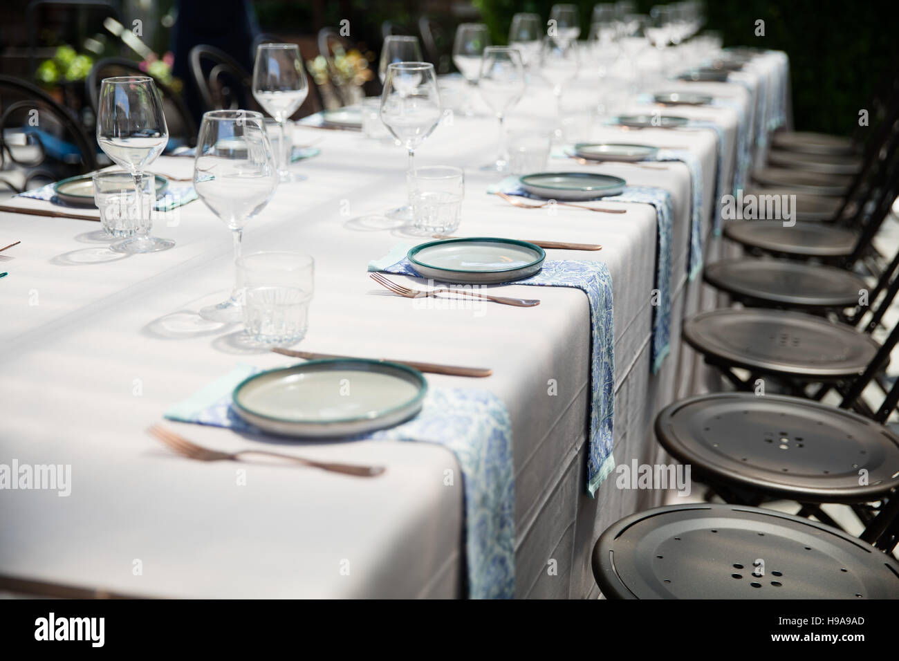 A long table laid out ready for a birthday party at a venue Stock Photo ...