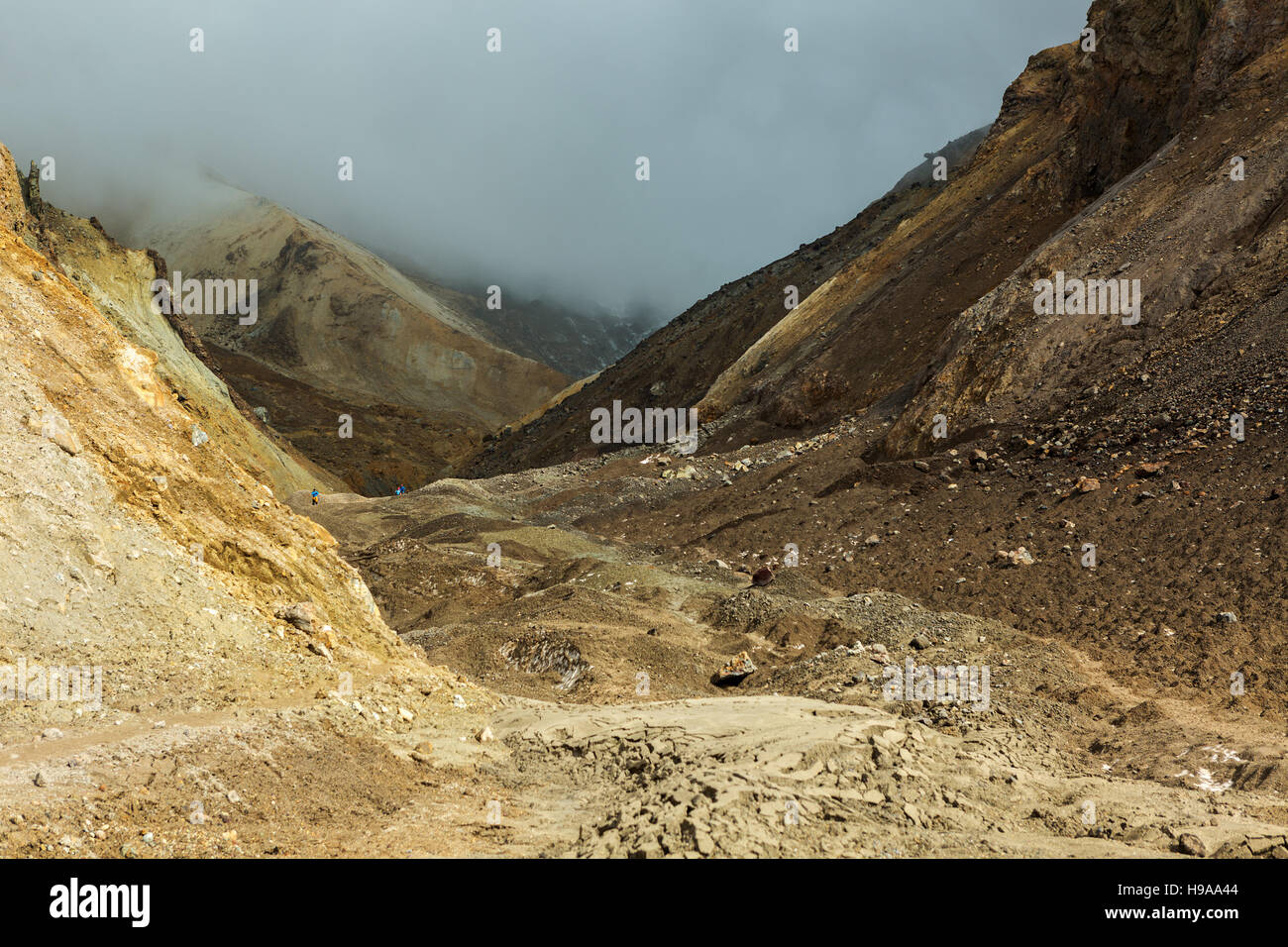 Climbing to active volcano Mutnovsky on Kamchatka Stock Photo - Alamy