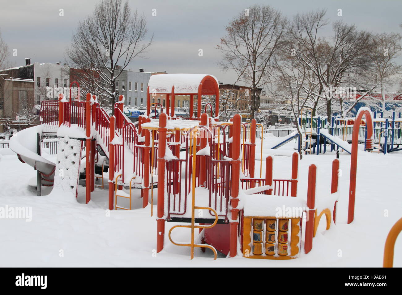 A playground covered in snow Stock Photo - Alamy