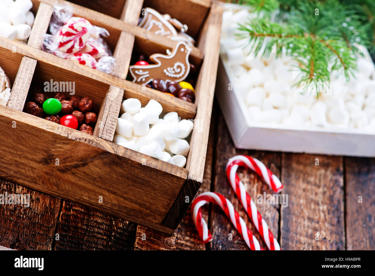 christmas candy in box and on a table Stock Photo - Alamy