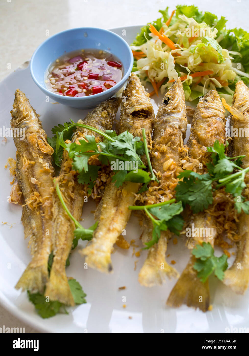 Fried "sand fish" at Sopa Seafood in Hua Hin, Thailand Stock Photo - Alamy