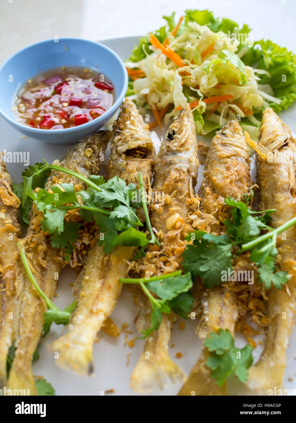 Fried "sand fish" at Sopa Seafood in Hua Hin, Thailand Stock Photo - Alamy