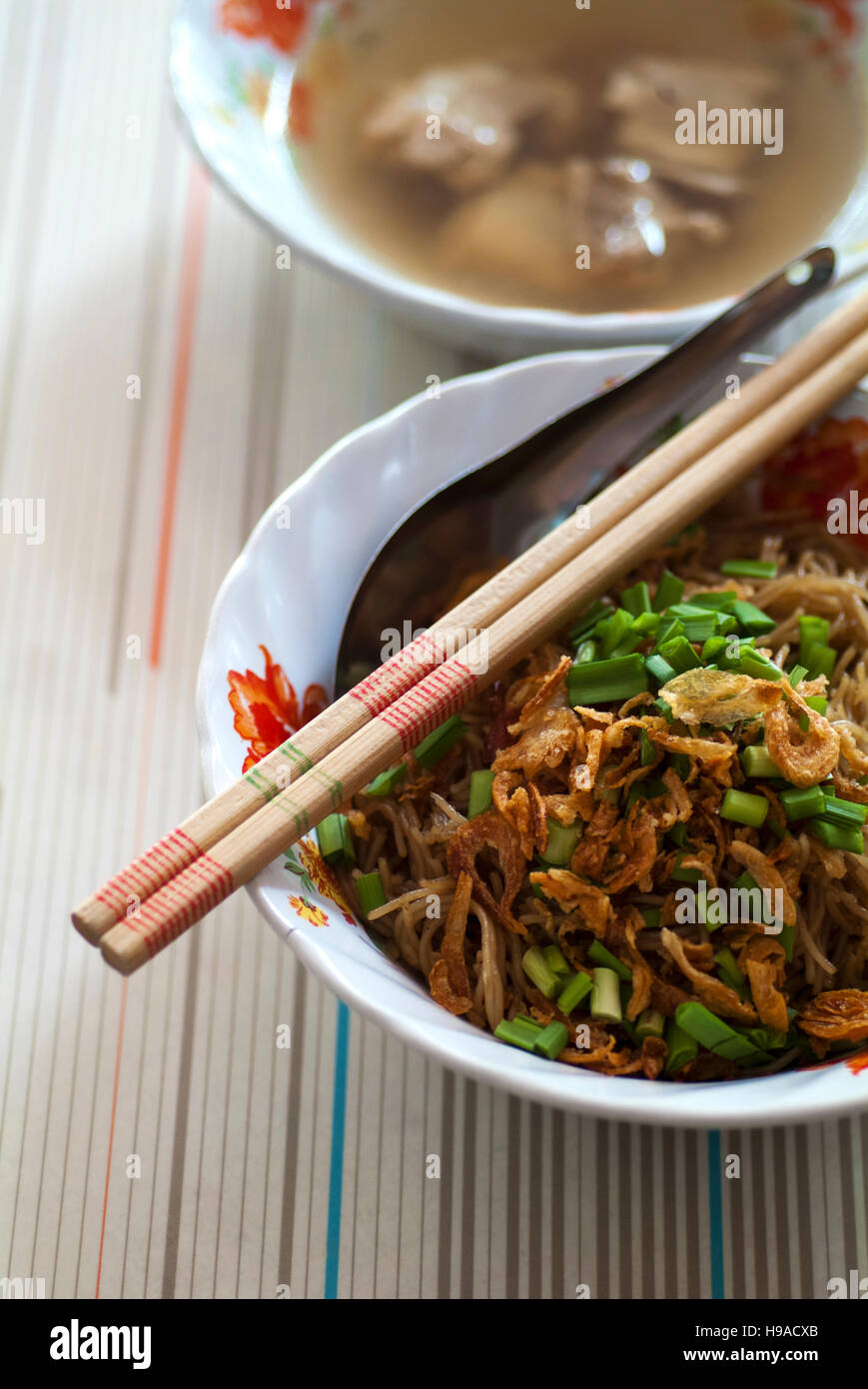 Mee hoon ba chang, thin Hokkien noodles with a pork spare rib soup, a ...