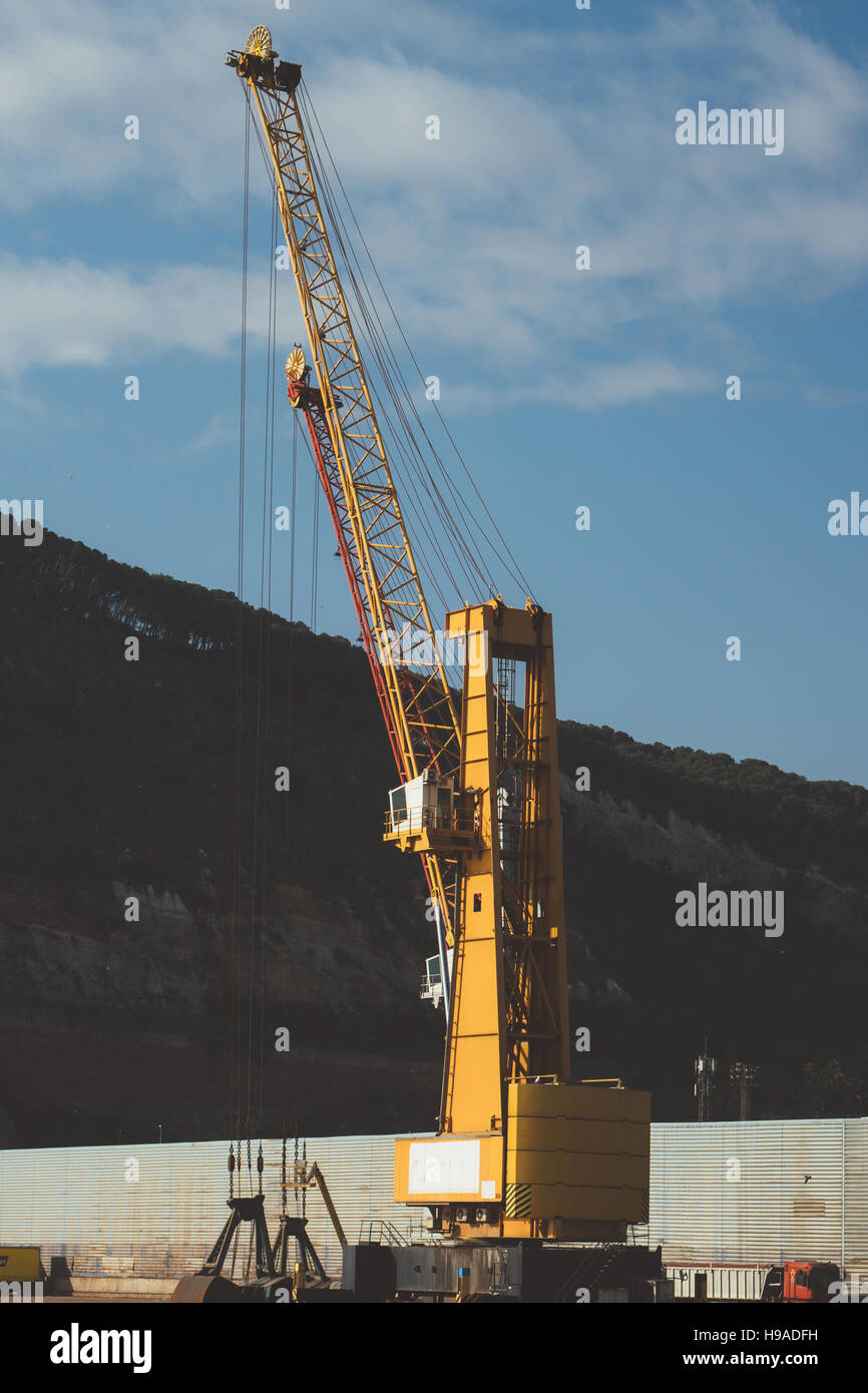 A yellow construction crane Stock Photo - Alamy