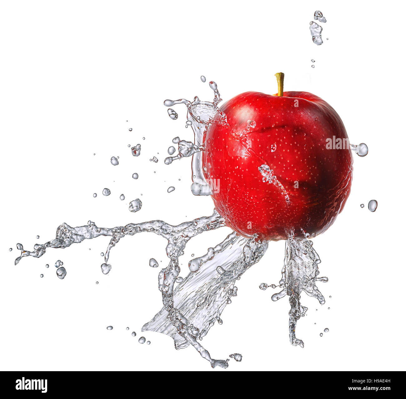 Water splash with apple isolated Stock Photo - Alamy