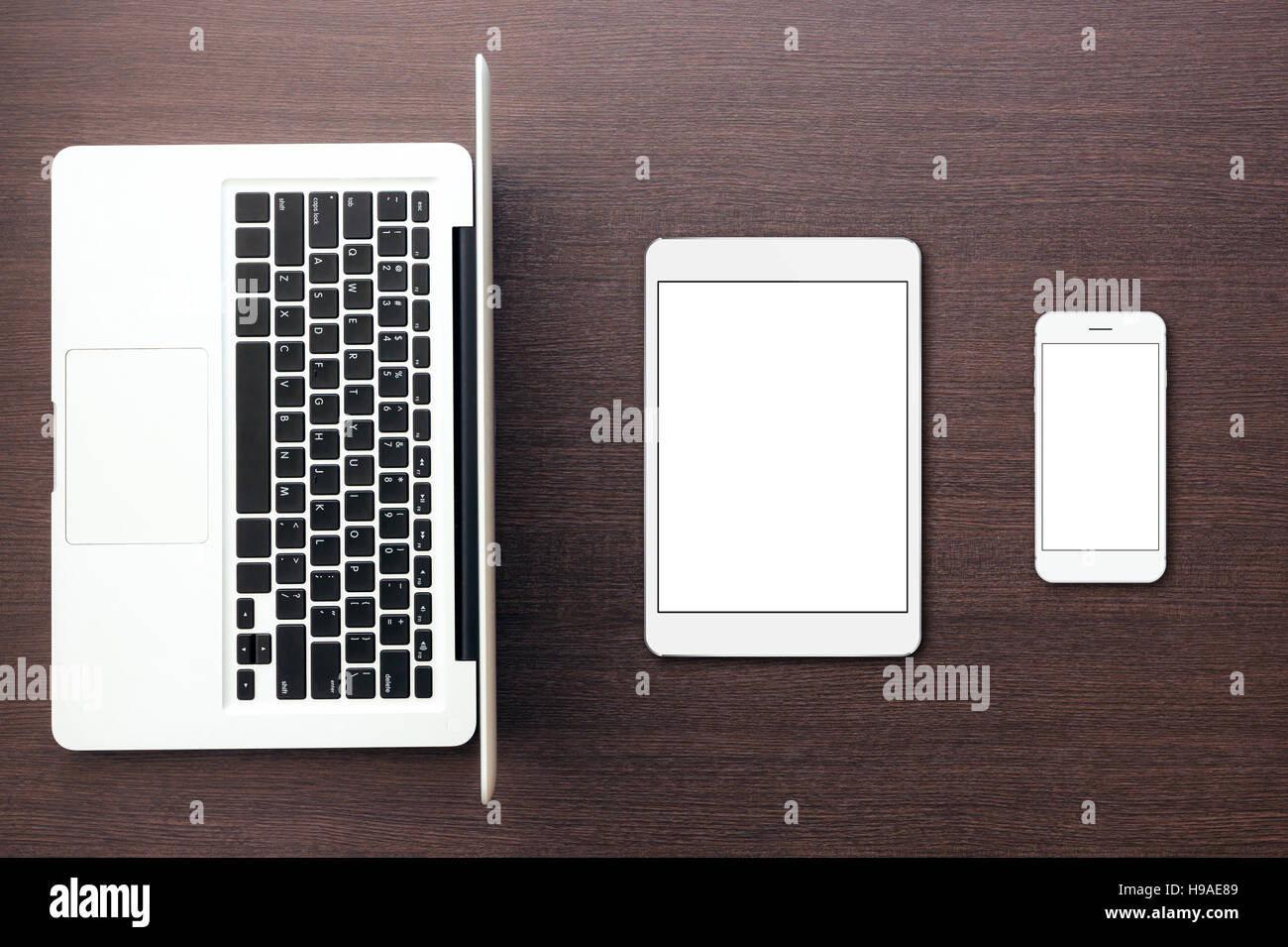 aptop tablet and phone on desk top view, mock-up tablet and phone Stock ...