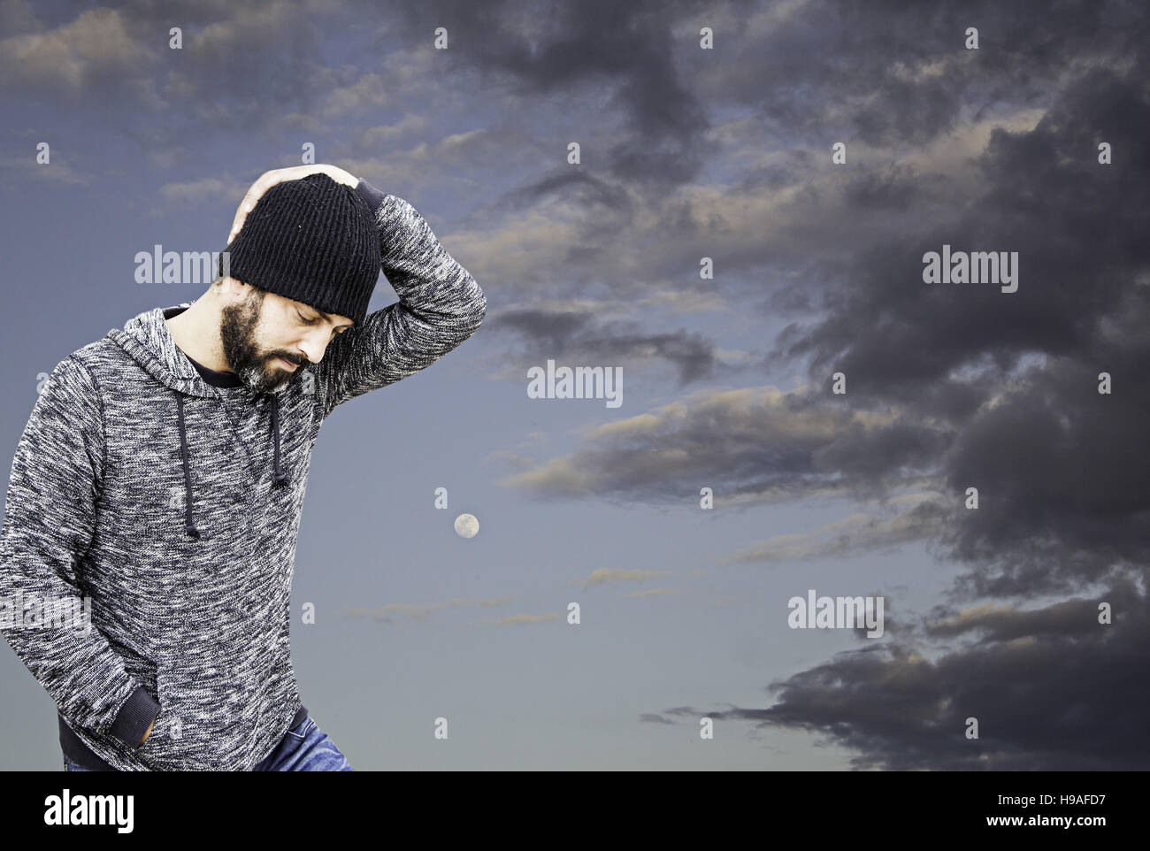 Boy rapper desperate urban street with blue sky Stock Photo - Alamy