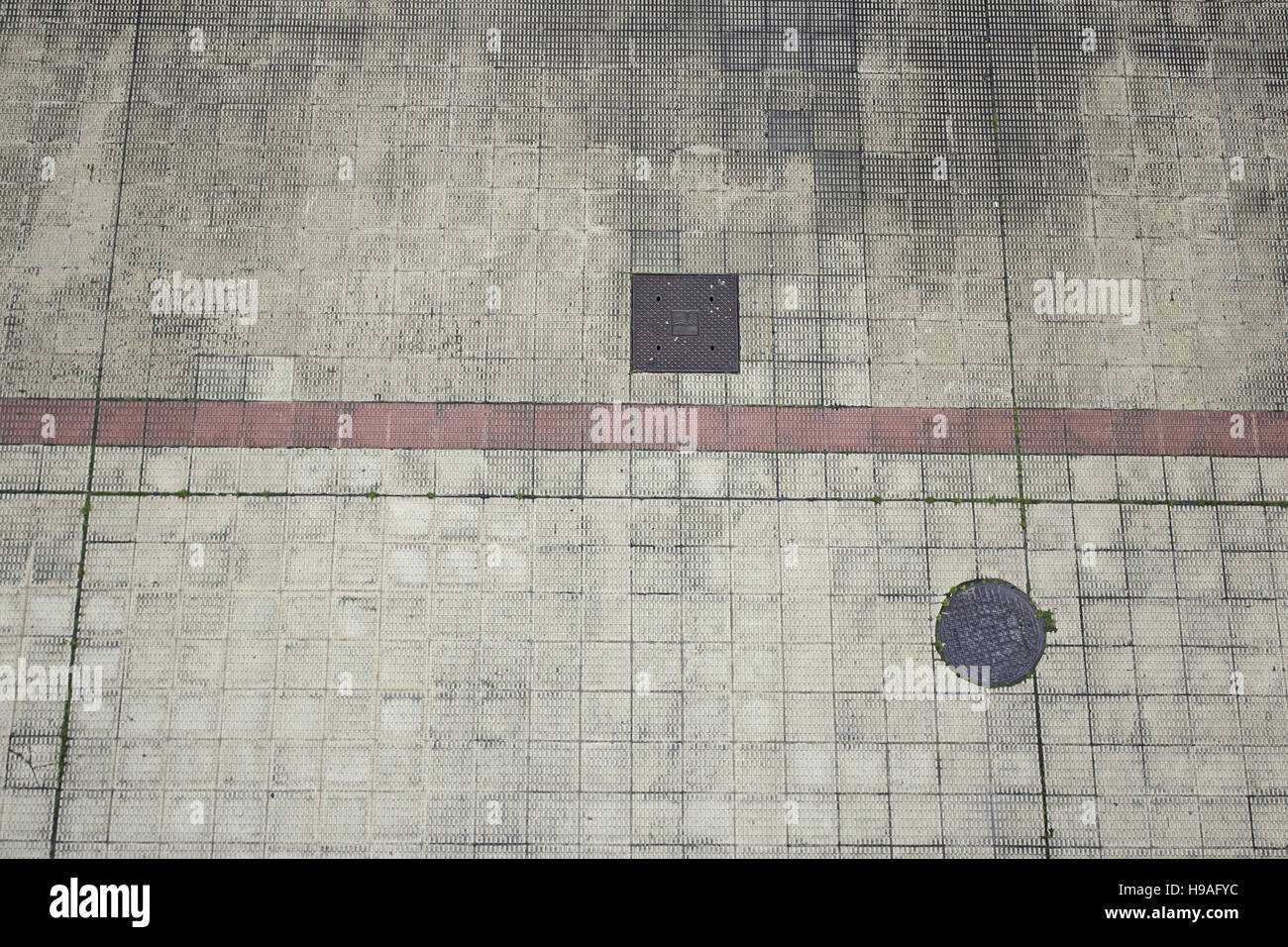Urban street painted floor tiles, construction Stock Photo - Alamy