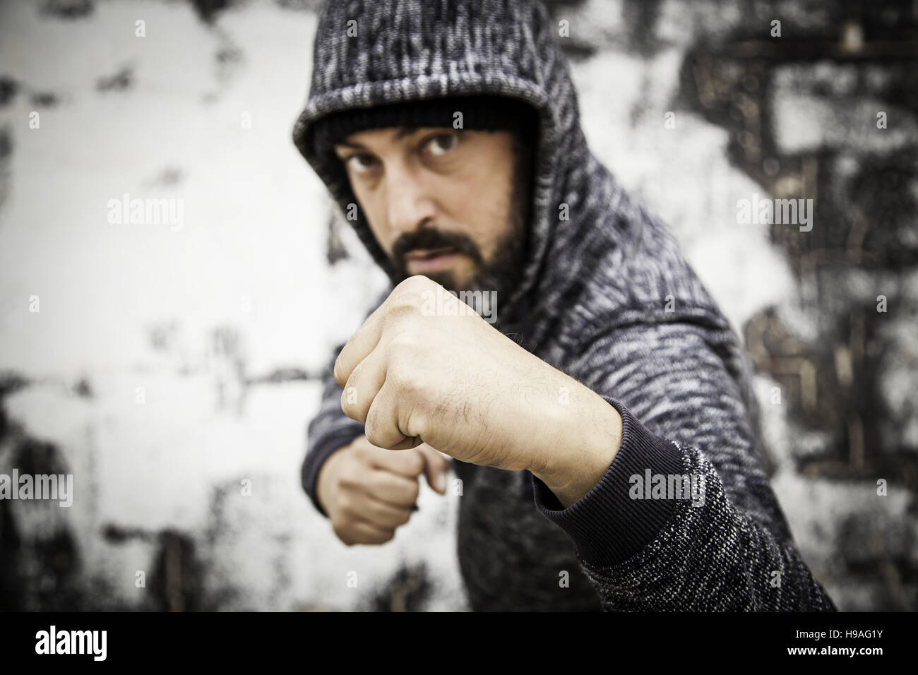 Man aggressive in street, rapper Stock Photo - Alamy