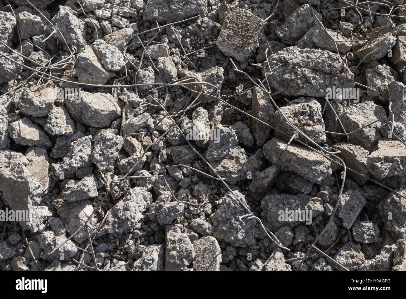 Broken shattered concrete with armature top view Stock Photo - Alamy
