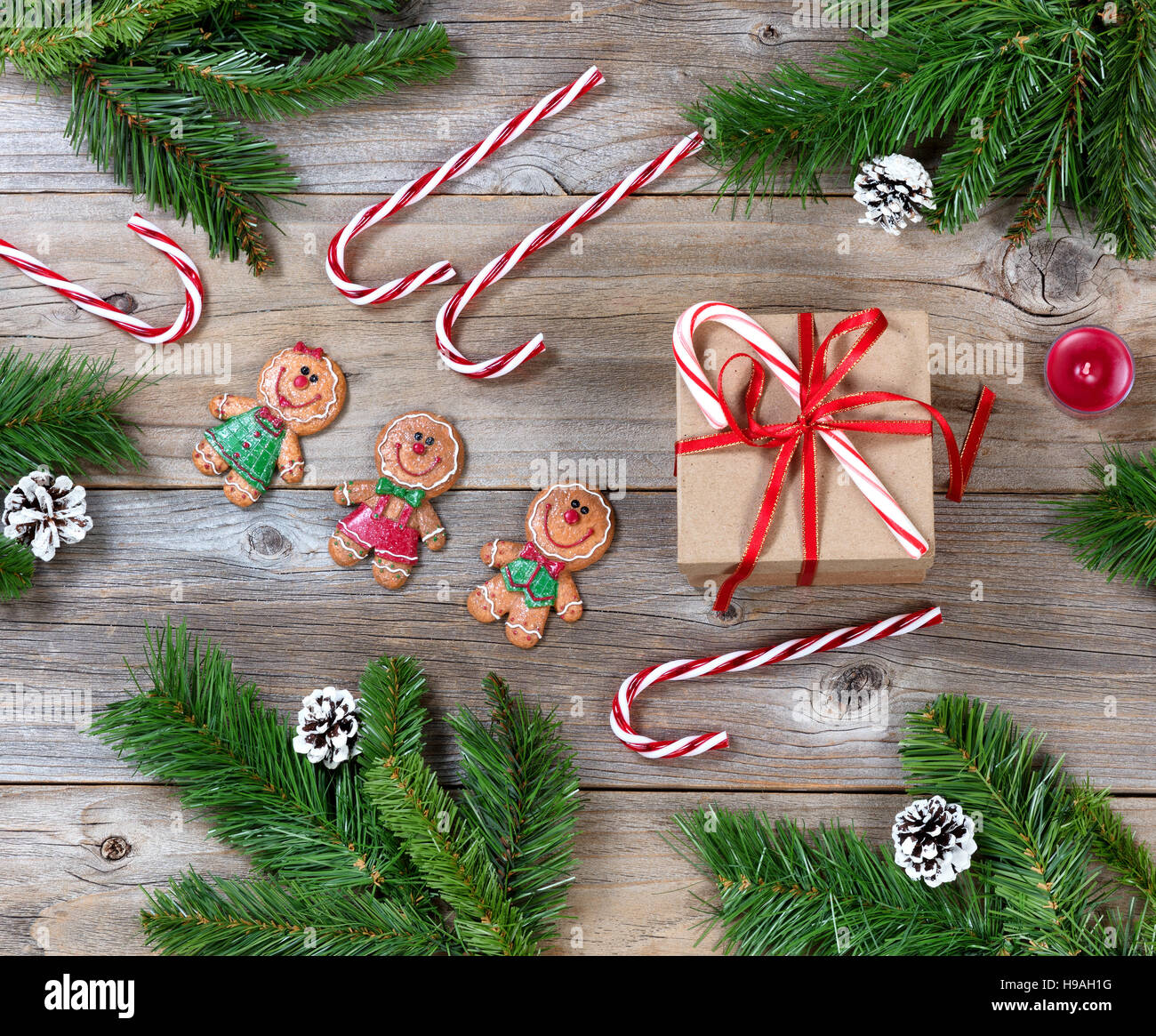 Overhead view of Christmas holiday objects on rustic wood Stock Photo ...