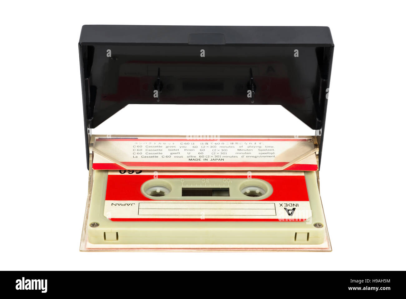 Vintage audio tape in the box isolated on white background with ...