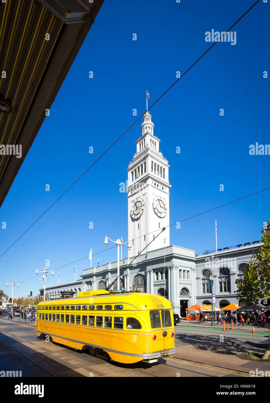 The historic, F-line streetcar in front of the Ferry Building along the ...