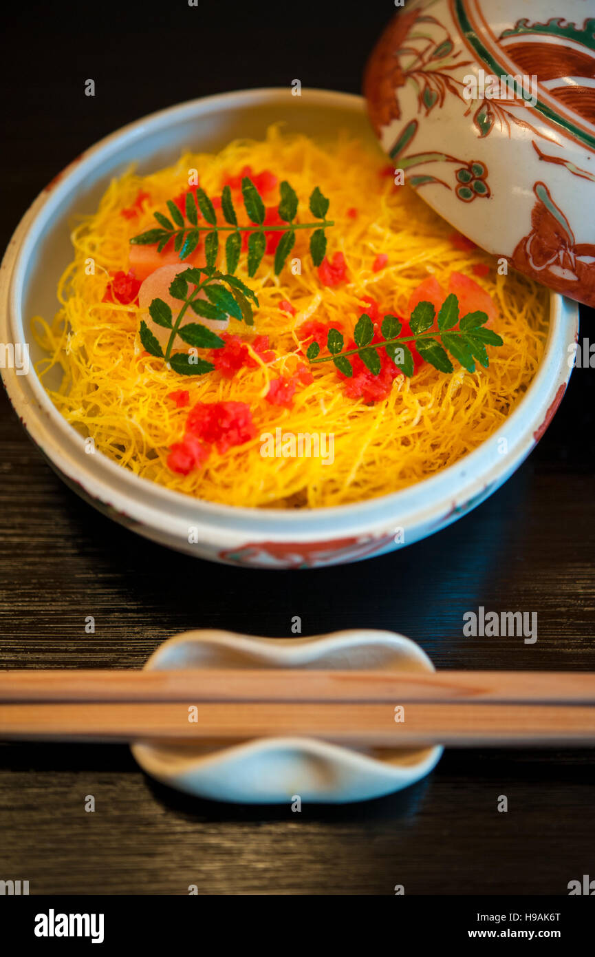 Sushi covered with a blanket of egg strands at Kichisen, the restaurant ...