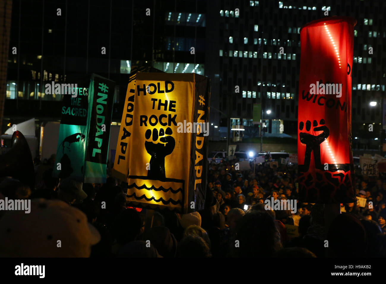 Illuminated banners "Hold the Rock, No Dapl" at a #NoDAPL demonstration ...