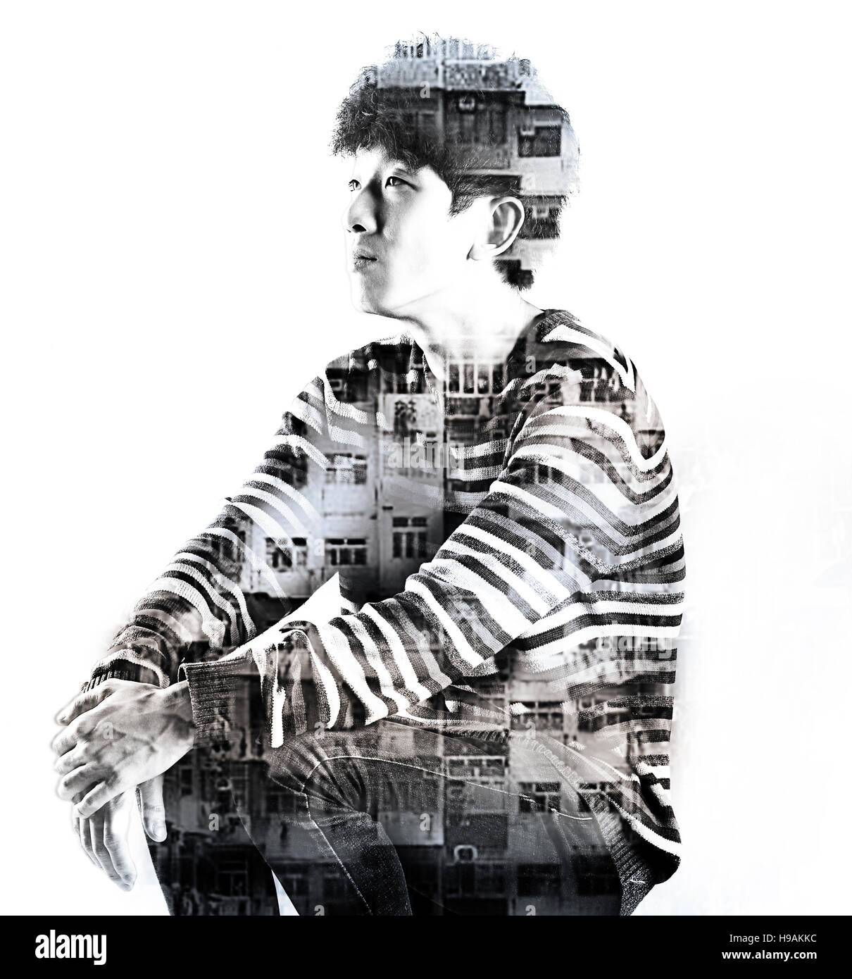 double exposure asian sad man and city buildings Stock Photo - Alamy