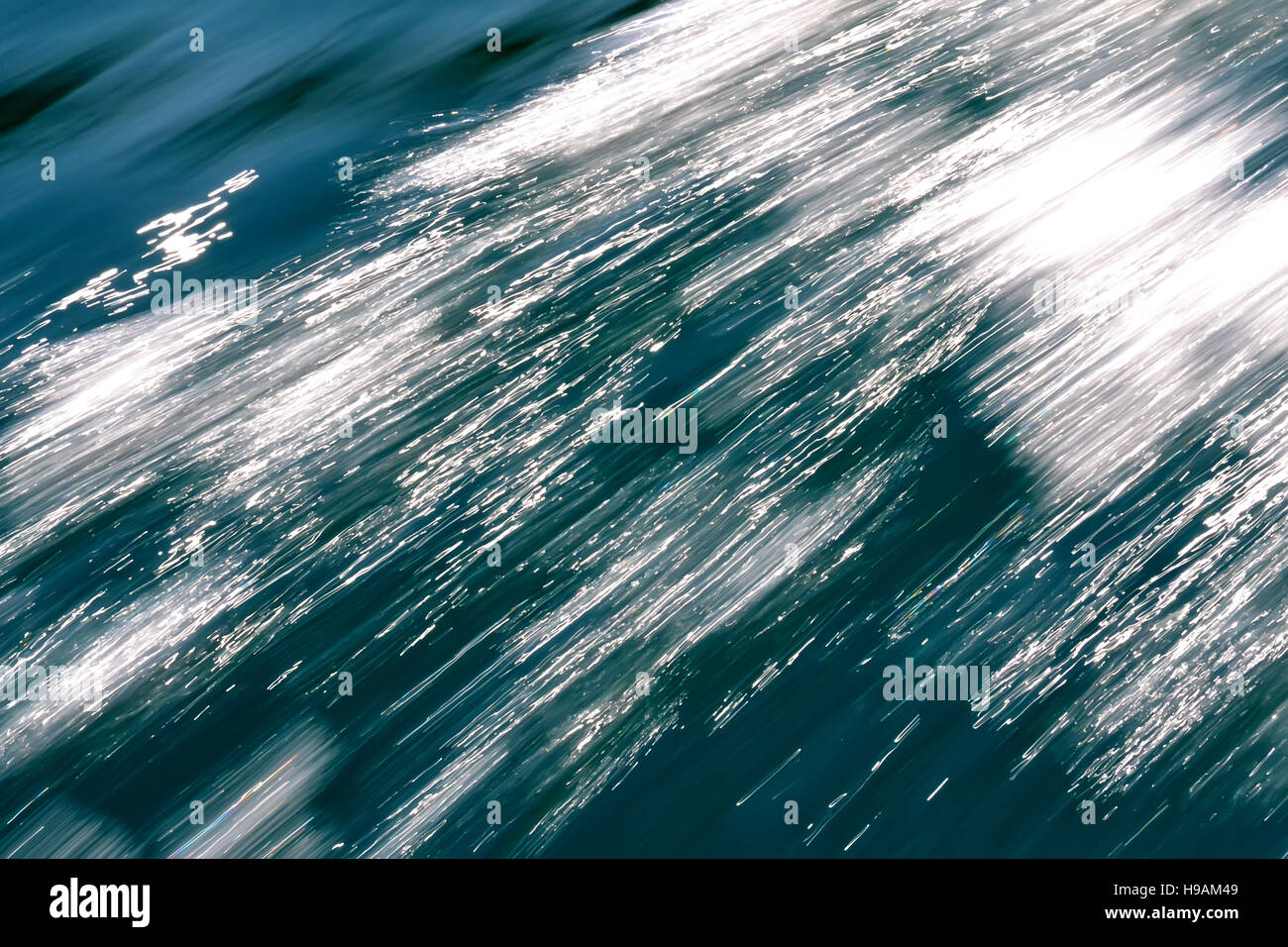 Speed on water with light reflection Stock Photo - Alamy