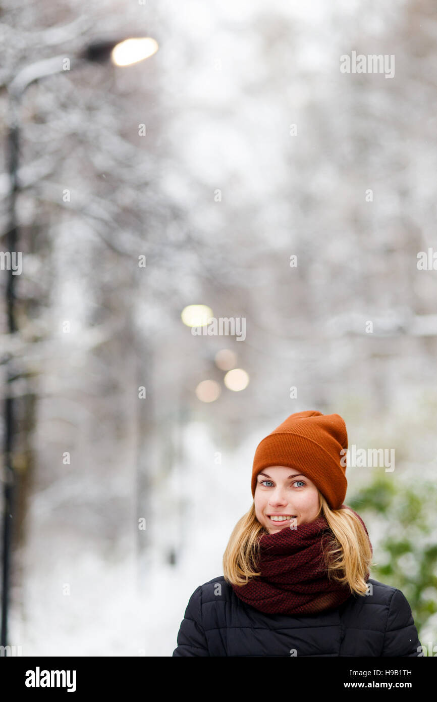Pretty girl in cap and jacket Stock Photo - Alamy