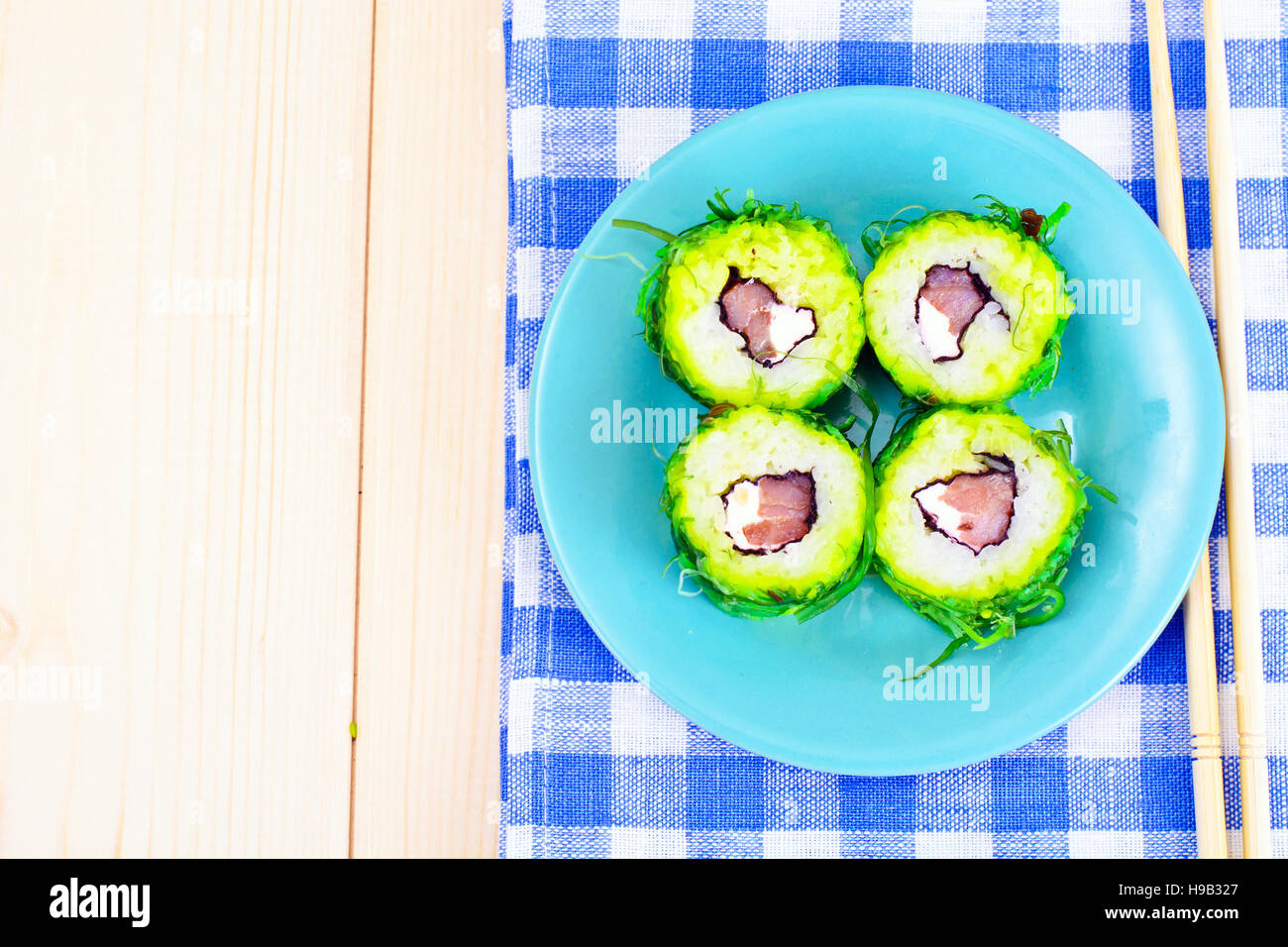 Sushi Roll with Chukoy, Salmon and Cheese. Studio Photo Stock Photo - Alamy