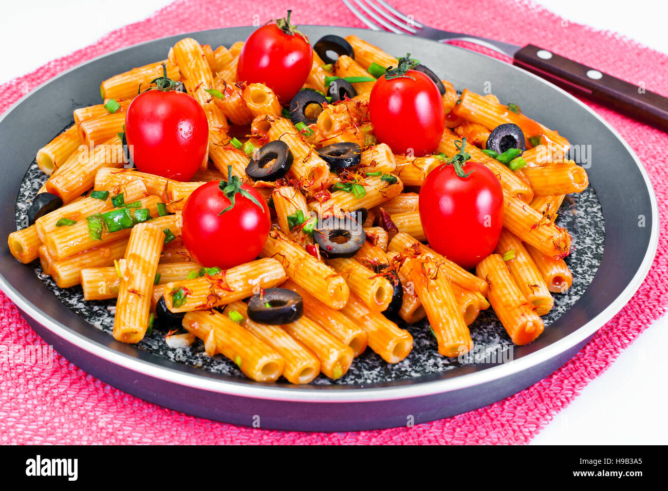 Pasta with Tomato Ketchup Sauce, Green Onions and Cheese Studio Photo ...
