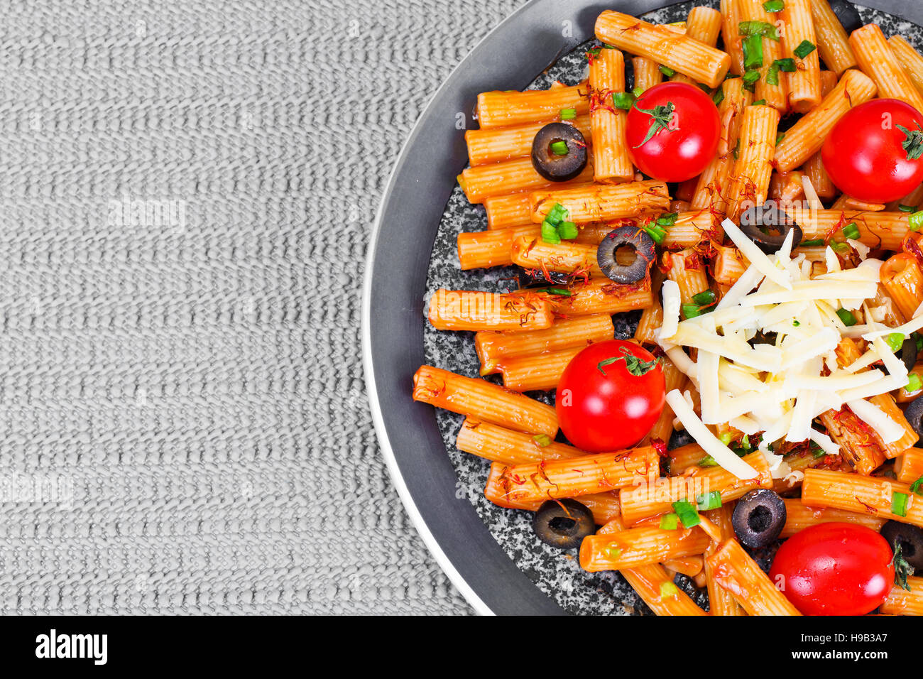 Pasta with Tomato Ketchup Sauce, Green Onions and Cheese Studio Photo ...