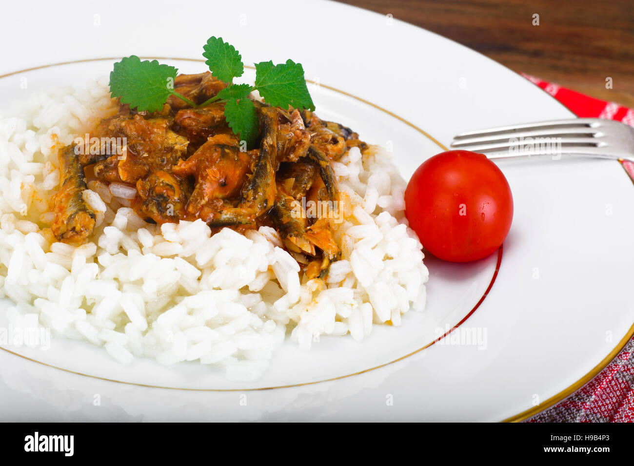Rice with Canned Fish in Tomato Sauce Studio Photo Stock Photo - Alamy