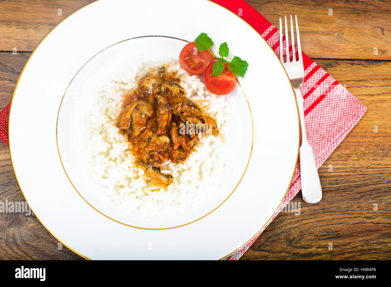 Rice with Canned Fish in Tomato Sauce Studio Photo Stock Photo - Alamy