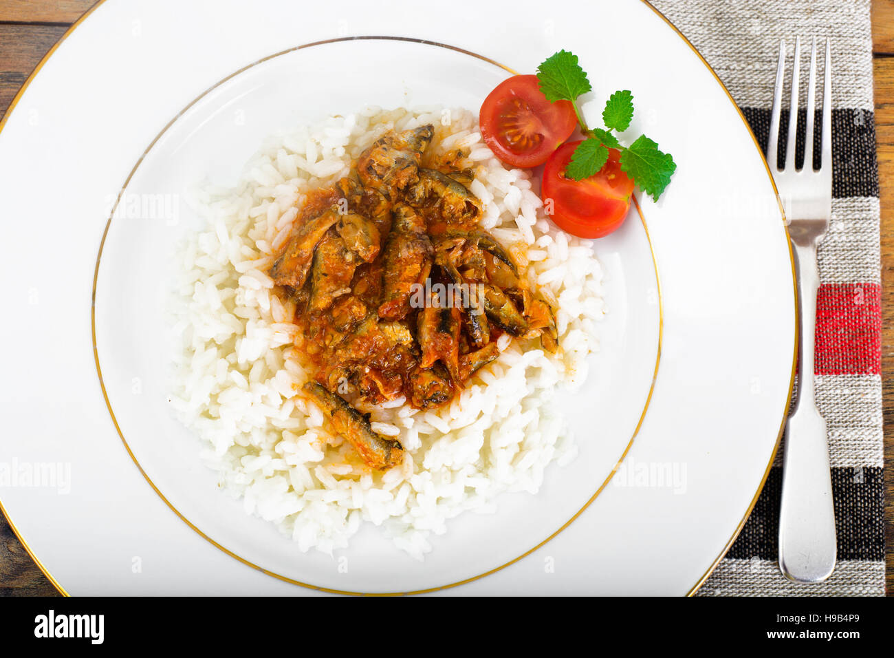 Rice with Canned Fish in Tomato Sauce Studio Photo Stock Photo - Alamy