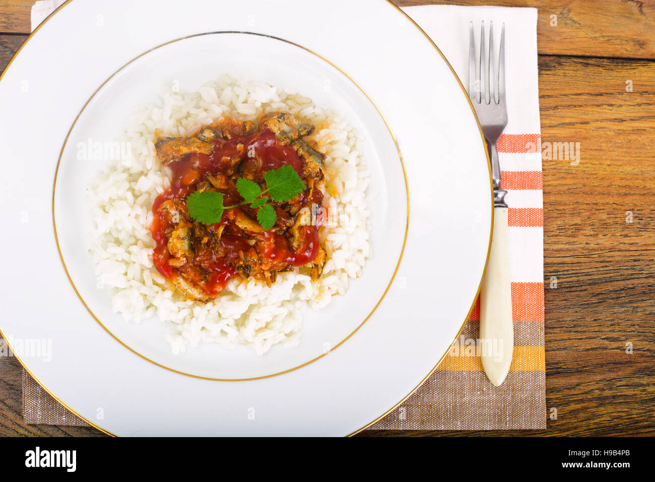 Rice with Canned Fish in Tomato Sauce Studio Photo Stock Photo - Alamy