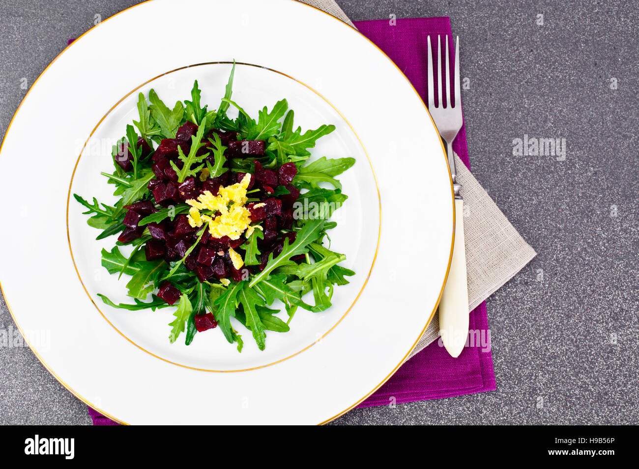 Dietary food without meat: Salad with arugula and beet. Studio Photo ...