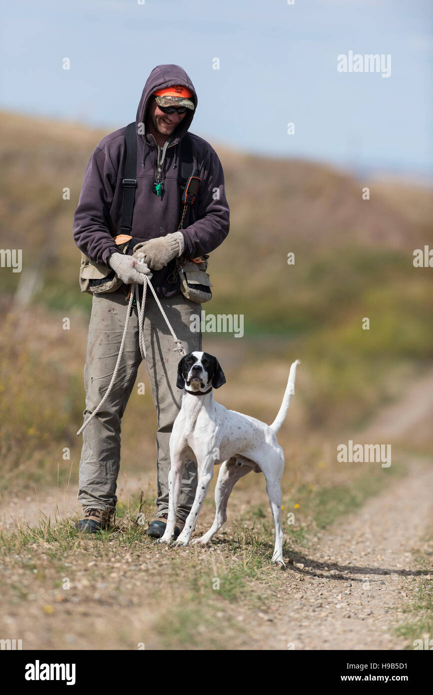 A hunter with an English Pointer Stock Photo - Alamy