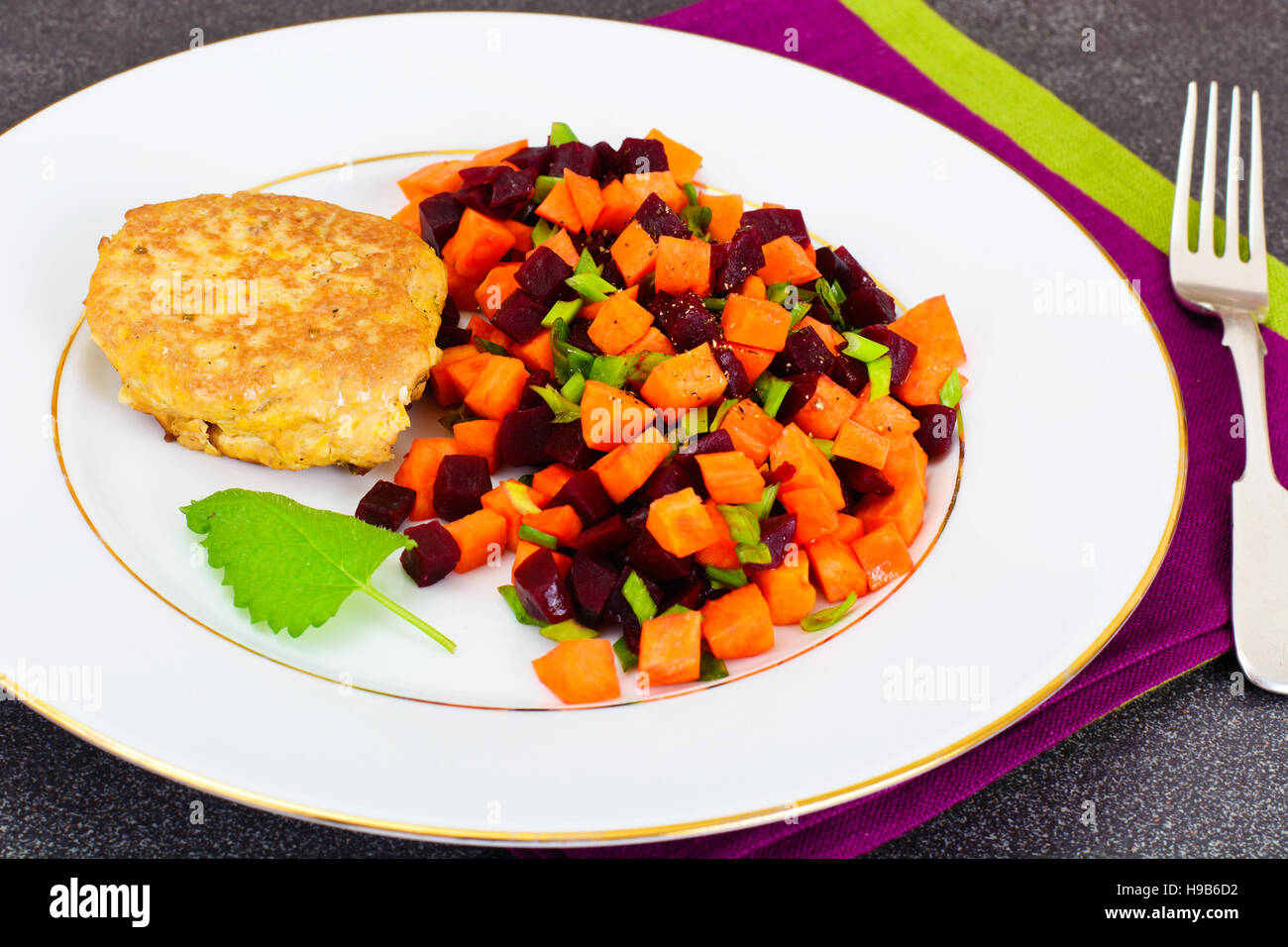 Fish Cutlet with a Salad of Carrots and Beets. Studio Photo Stock Photo ...