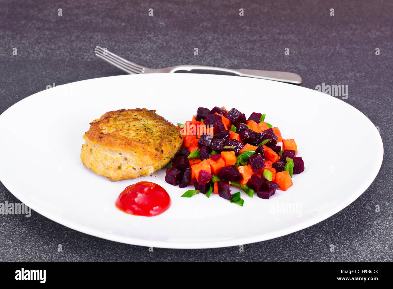 Fish Cutlet with a Salad of Carrots and Beets. Studio Photo Stock Photo ...