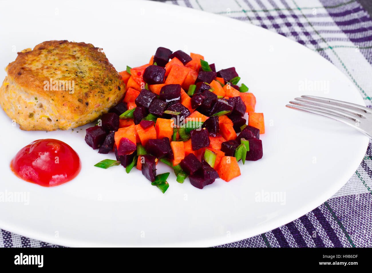 Fish Cutlet with a Salad of Carrots and Beets. Studio Photo Stock Photo ...