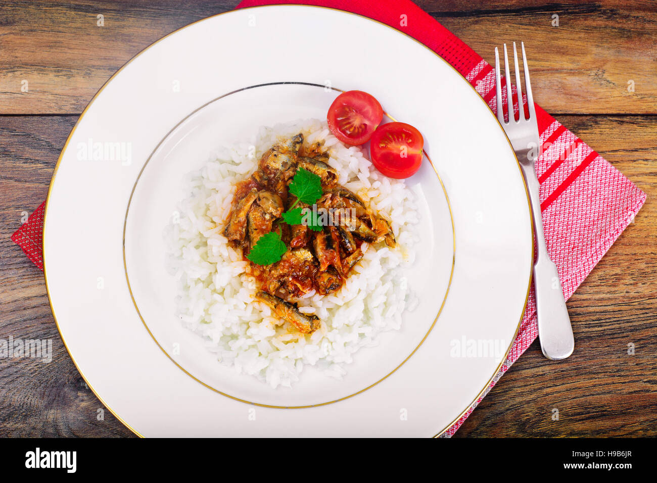 Rice with Canned Fish in Tomato Sauce Studio Photo Stock Photo - Alamy