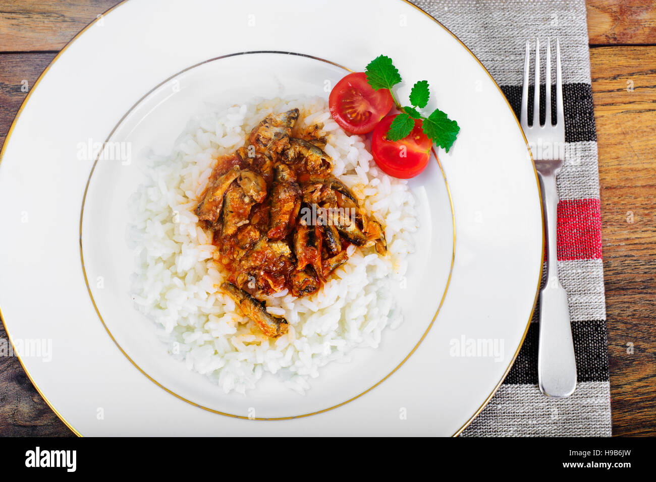 Rice with Canned Fish in Tomato Sauce Studio Photo Stock Photo - Alamy