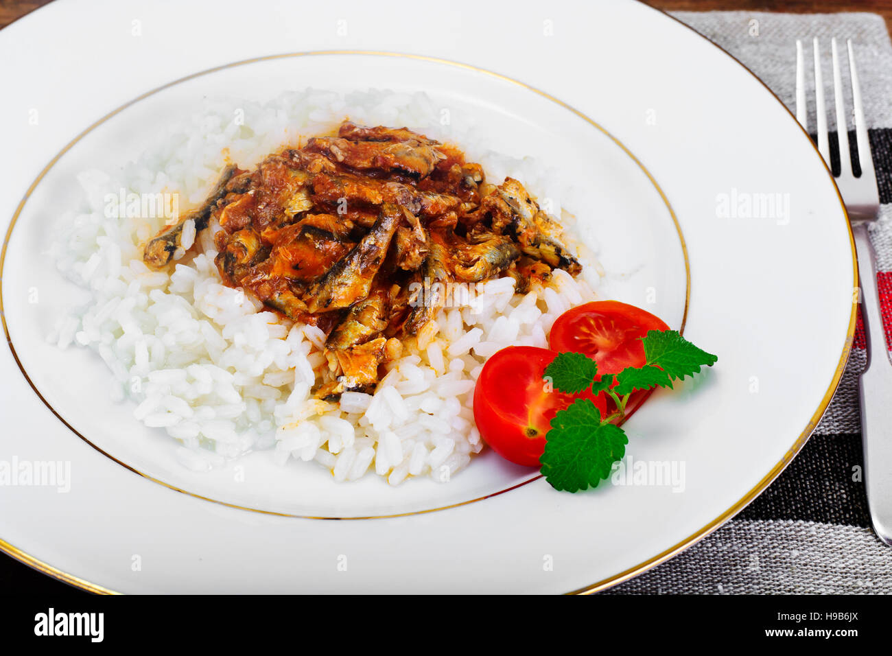 Rice with Canned Fish in Tomato Sauce Studio Photo Stock Photo - Alamy