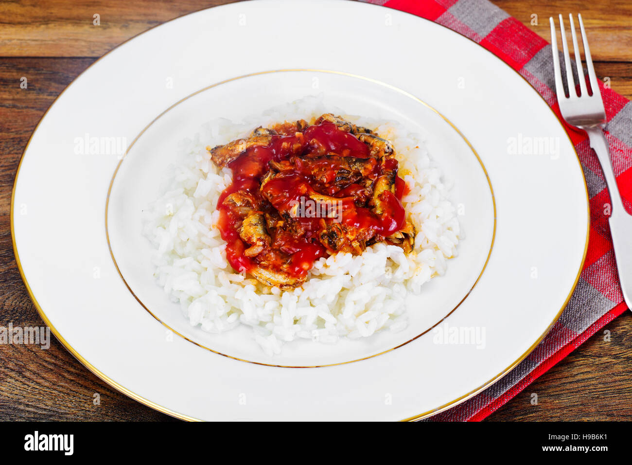 Rice with Canned Fish in Tomato Sauce Studio Photo Stock Photo - Alamy