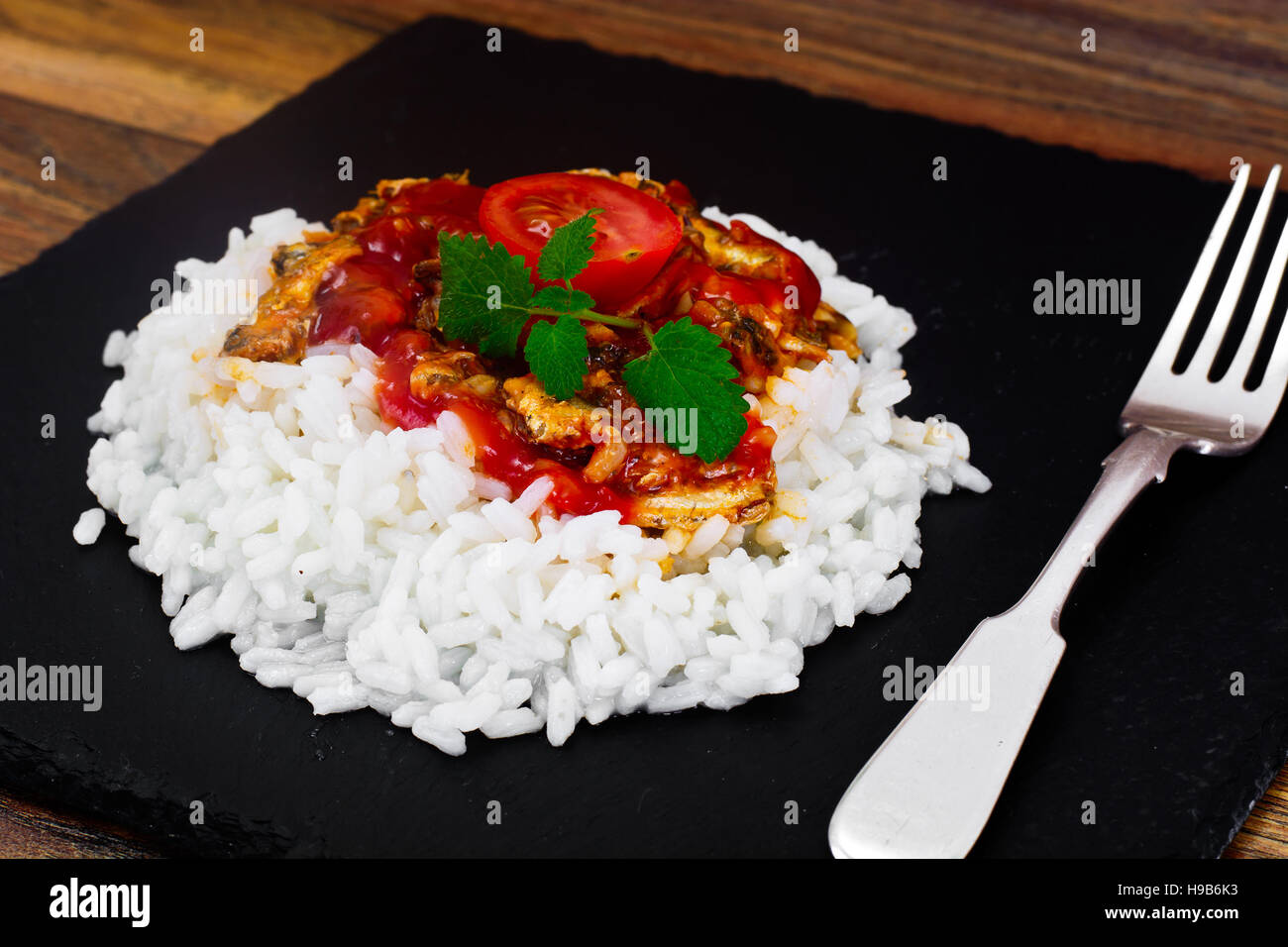 Rice with Canned Fish in Tomato Sauce Studio Photo Stock Photo - Alamy