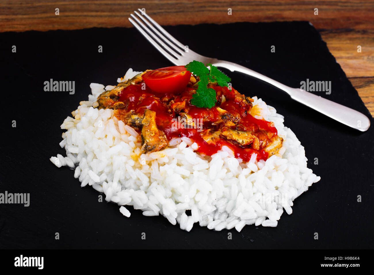 Rice with Canned Fish in Tomato Sauce Studio Photo Stock Photo - Alamy