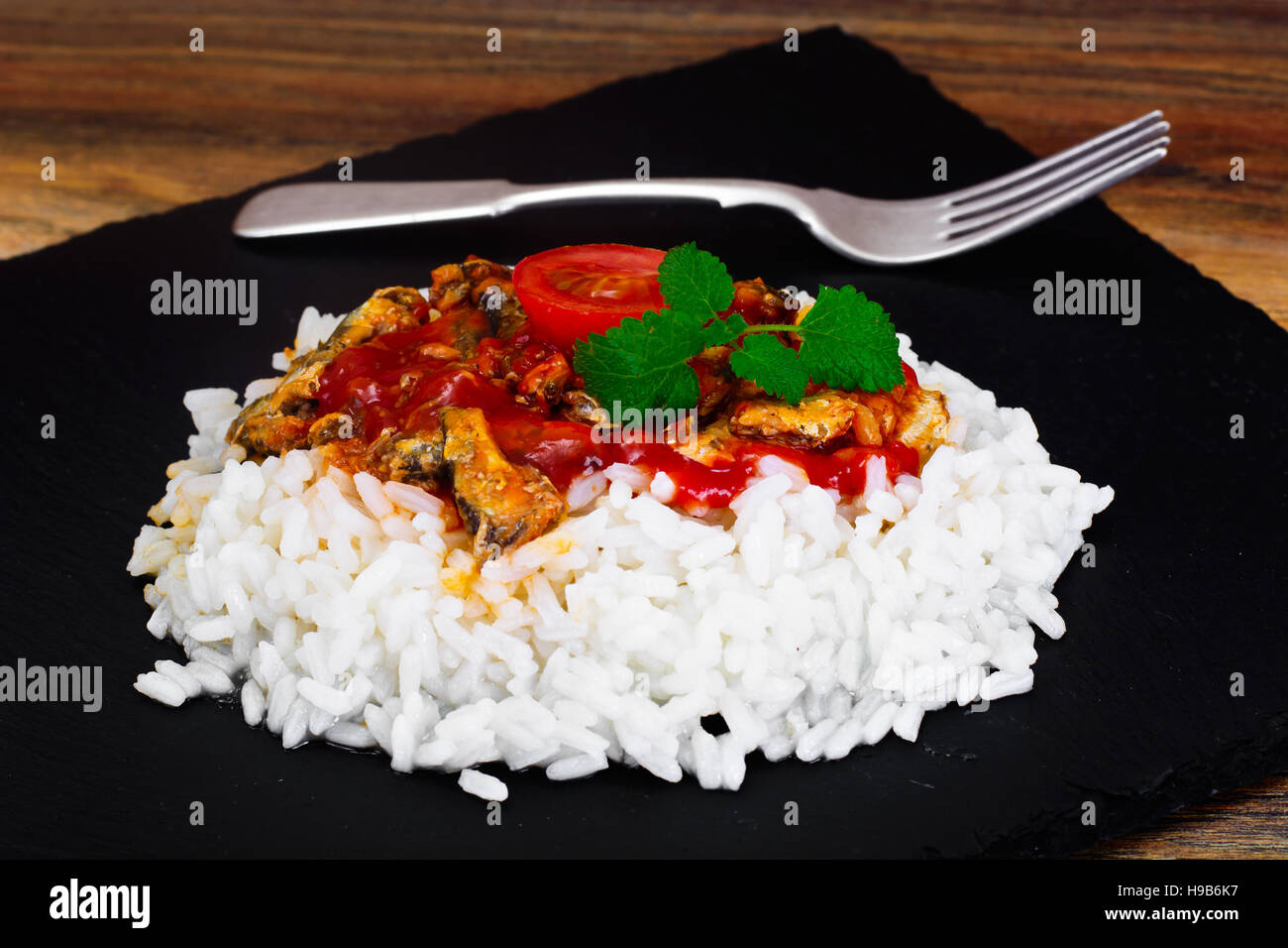 Rice with Canned Fish in Tomato Sauce Studio Photo Stock Photo - Alamy