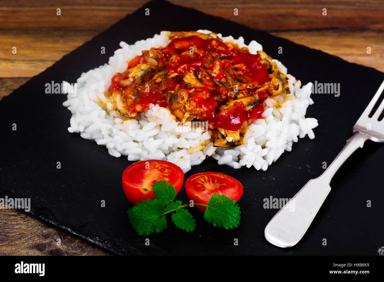 Rice with Canned Fish in Tomato Sauce Studio Photo Stock Photo - Alamy
