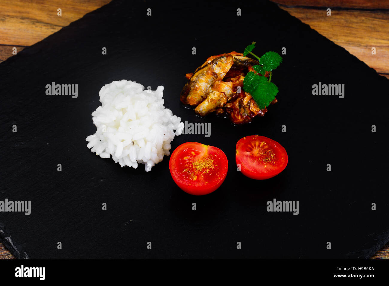 Rice with Canned Fish in Tomato Sauce Studio Photo Stock Photo - Alamy